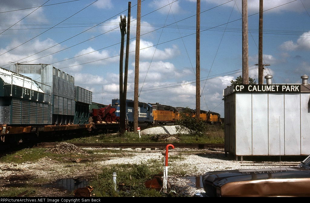 CR 6650, UP 3220, 3516, CNW 6864, and 6920
